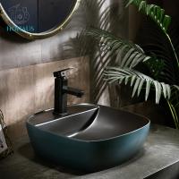 China Retro Bathroom Countertop Basin Round Best Ceramic Electroplated Surface Anti Stain for sale