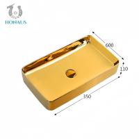 China Luxury Bathroom Countertop Basin Electroplated Gold Ceramic Mirror Surface for sale