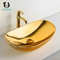 China Luxury Bathroom Countertop Basin Electroplated Gold Ceramic Mirror Surface for sale