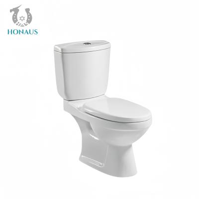 China Two Piece Toilet Bowl Dual Flush 650x370x775mm Soft Close Cover Anti Stain Ceramic for sale