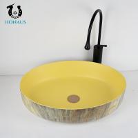 China Modern Yellow Ceramic Countertop Basin 390x140x545mm Customizable Round Shape for Hotel Apartment for sale