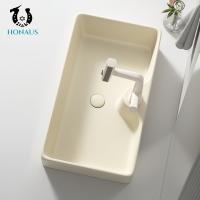 China Luxury Bathroom Countertop Basin Premium Quality Ceramic Cream Modern Fast Drain for sale