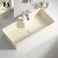 China Luxury Bathroom Countertop Basin Premium Quality Ceramic Cream Modern Fast Drain for sale
