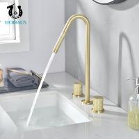 China Luxury Wash Basin Faucet Copper Body Electroplated Golden Two Handles Mixer Hot Cold Water for sale