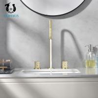 China Luxury Wash Basin Faucet Copper Body Electroplated Golden Two Handles Mixer Hot Cold Water for sale