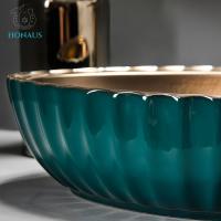 China Bathroom Countertop Basin Ceramic Made Art Design Electroplated Egg Shape for sale