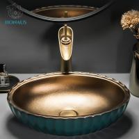 China Bathroom Countertop Basin Ceramic Made Art Design Electroplated Egg Shape for sale
