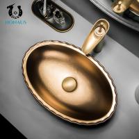 China Bathroom Countertop Basin Ceramic Made Art Design Electroplated Egg Shape for sale