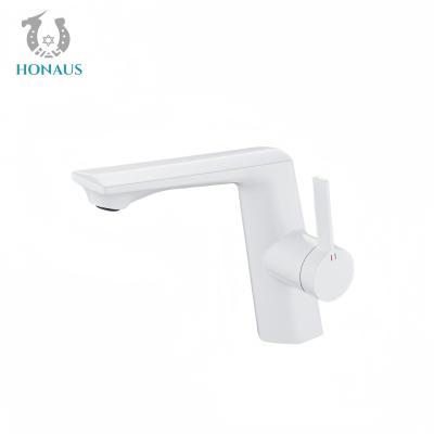 China Luxury Brass Wash Basin Faucet Electroplated Hot Cold Water Mixer Premium Ceramic Valve Core Deck Mounted for sale