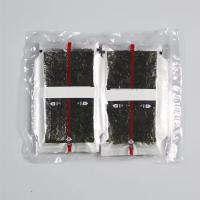 China Custom Safe Food Clear Plastic Restaurant Triangle Onigiri Nori Sheets with 21 cm Length and 24 Months Shelf Life for sale