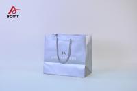 China Silver Color Printable Art Paper Bags Silver Handle Kraft Paper Sacks for sale
