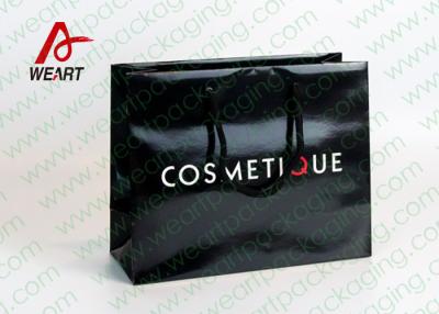 China Personalized Kraft Paper Gift Bags With Ribbon Handle Embossing Surface Finishing for sale