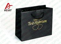 China Shirt Shop Black Custom Branded Paper Bags With Logo Matte Lamination Suface for sale