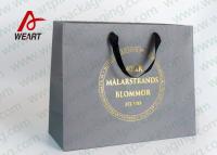 China Printed Foil Logo Ribbon Paper Bag Customized Collapsible Shopping Bag for sale