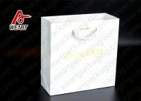 China Modern Custom Boutique Shopping Bags , White Packaging Paper Bags With Ribbon Handle for sale