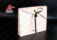 China Yellow & Black Color Customized Logo Promotional Paper Bags Glossy Lamination for sale