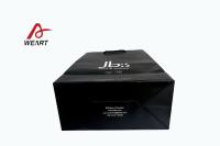 China Customized Art Paper Bags With Black Handles LOGO In Negative For Carry for sale