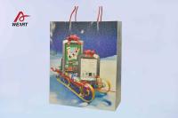 China Art Christmas Paper Bags , Unique Christmas Gift Bags Blue Cotton Handle for sale