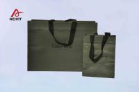 China Special Customized Paper Bags Blue Color Embossed Logo With Blue Handle for sale