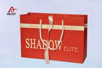 China Red Art Paper Bags / Colored Paper Gift Bags Middle Hole Glued White Ribbon​ for sale