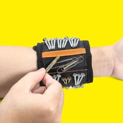 China Adjustable Strong Magnetic Wristband Tool Holding Screws Magnetic Wristband for sale