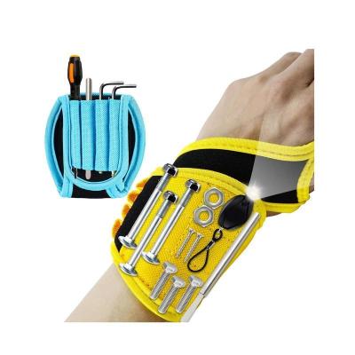 China Waterproof Magnetic Wristband With Flashlight For Holding Screws Nail Drill Bit for sale
