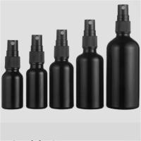 China Thickened CE Glass Bottles with Sprayer Leakproof 4 Oz Black Glass Spray Bottles 18mm for sale