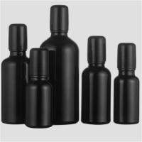 China Thickened CE Glass Bottles with Sprayer Leakproof 4 Oz Black Glass Spray Bottles 18mm for sale