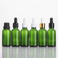 China Green Essential Oil Glass Dropper Bottles 5ml 15ml 100ml Low Borosilicate Glass for sale