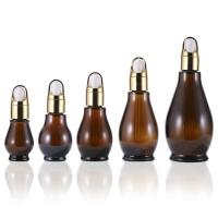 China Amber Glass Essential Oil Bottles with Roller Ball 30ml 50ml Borosilicate Glass for sale