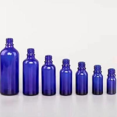 China OEM 30ml Blue Glass Dropper Bottle for Essential Oils Durable Borosilicate Glass for sale