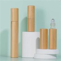 China Eco Friendly Bamboo Roll On Perfume Bottle 30ml 50ml Non Toxic Glass Dropper Bottle for sale