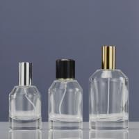 China Lidded Empty Perfume Spray Bottle 30ml 50ml 100ml Crystal Glass OEM for sale