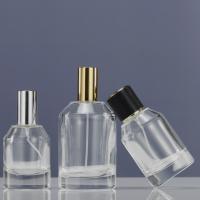 China Lidded Empty Perfume Spray Bottle 30ml 50ml 100ml Crystal Glass OEM for sale