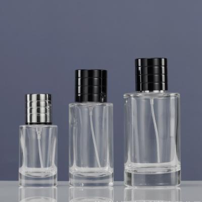 China ISO9001 Lidded Round Glass Perfume Spray Bottle 30ml 50ml OEM for sale