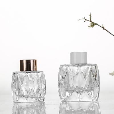 China Non Toxic Empty Reed Diffuser Glass Bottles 100ml 200ml Crystal Oil Diffuser Square for sale