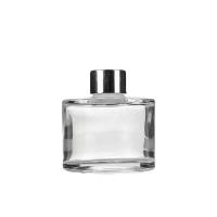 China Lidded Round Diffuser Glass Bottles Ultralight Reusable 50ml 100ml 150ml for sale