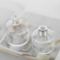 China Lidded Round Diffuser Glass Bottles Ultralight Reusable 50ml 100ml 150ml for sale