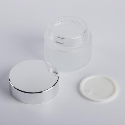 China Frosted Glass Cream Jar 20g 30g 50g Washable Empty Moisturizer Container with Lid for sale