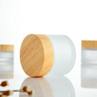 China 10g 50g 100g Frosted Cream Jar with Bamboo Lid Odorless Multifunctional Cosmetic Container for sale