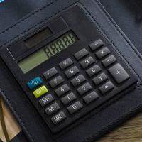 China ODM A5 Loose Leaf PU Bank Notebook With Leather Cover Built In Calculator for sale