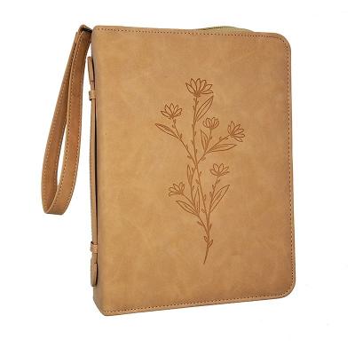 China Dustproof Genuine Leather Bible Case Bag With Hand Strap Floral Debossed Zipper for sale