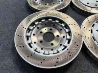 China Rotor Drill Car Spare Part One Piece Brake Disc For Mitsubishi OEM High Temperature Resistance Auto Spare Parts Two-Piece Front Brake Disc for sale