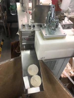 China CR002 Automatic Tape Winding Machine for HME Filters - 22-60mm Roll Diameter, 220V Stainless Steel Construction for sale