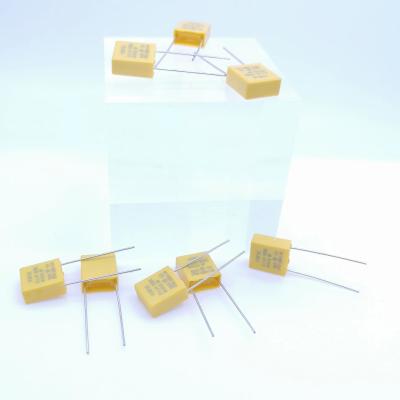 China Resistive And Capacitive Pressure Relief Capacitor 0.1UF 310V P7.5MM Yellow Color for sale