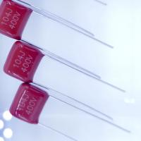 China Metallized Polyester Film Mini Capacitor CL21X 104J400V Laser Printing for sale