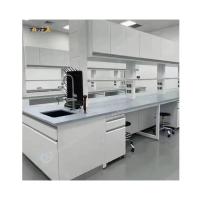 China Adjustable White Laboratory Island Bench All Steel Lab Bench With 2 Shelves And 4 Wheels for sale