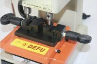 China 180W Motor Power Electric Key Cutting Machine for Duplicate Key Making Voltage 110/220V for sale