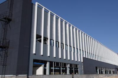China Industrial Prefab Store Warehouse Metal Building Construction with Guide Installation for sale