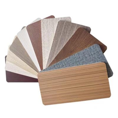 China Multi-Functional Texture Wood Wall Covering  Wooden PVC Wall Panel for Home Hotel Interior Design Fabric Backed for Bathroom Gym for sale